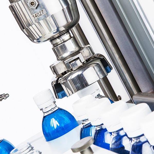 Automated Filler/capper monoblock | MACHINERY | Remplast Caps